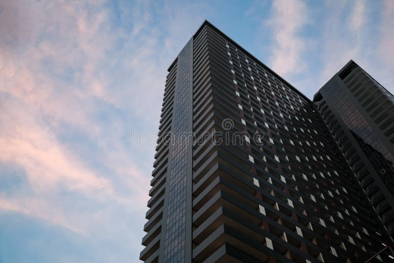 Beautiful Skyscraper Against Blue Sky, Low Angle View Stock Photo ...