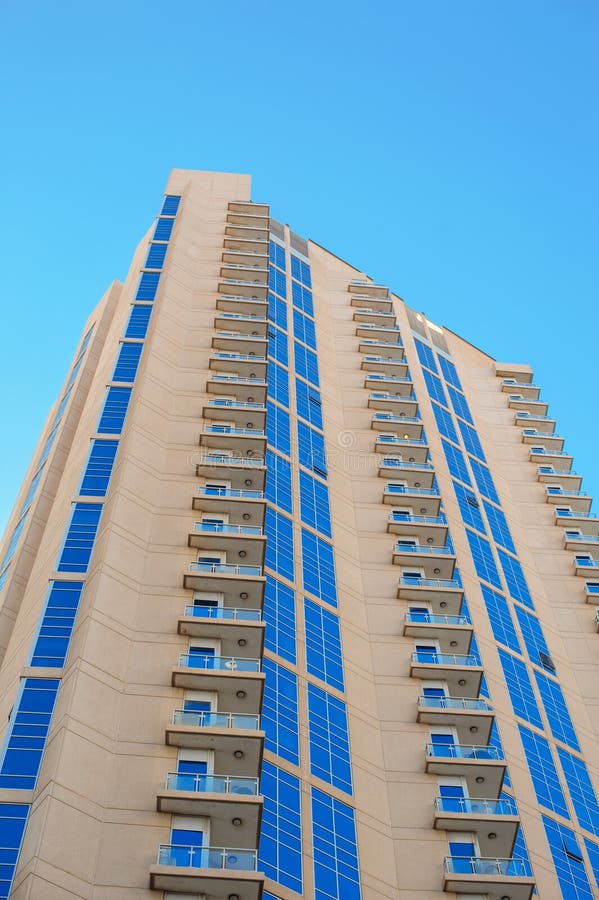 Beautiful Skyscraper on a Background of Blue Sky Stock Image - Image of ...