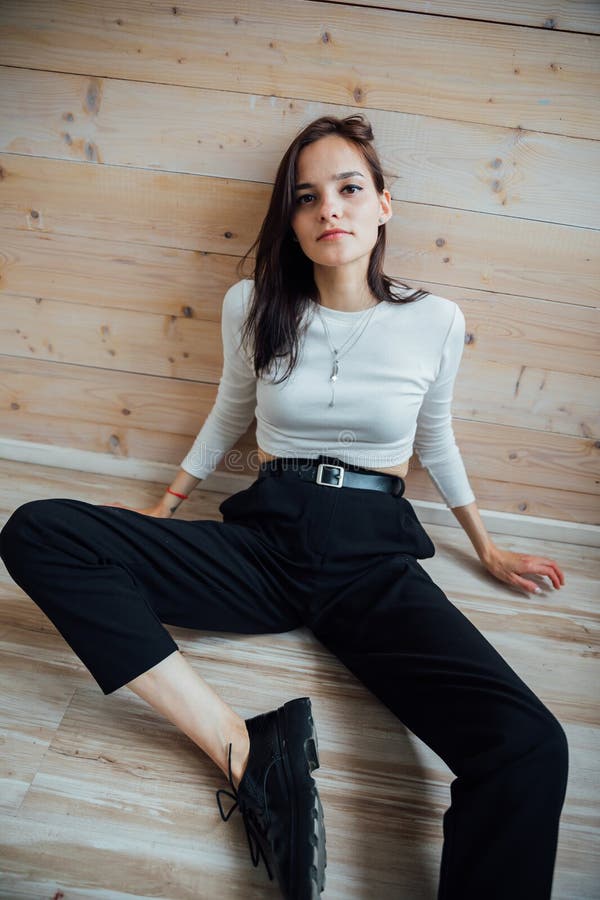 Beautiful Slender Young Woman Sitting on the Floor Stock Photo - Image ...