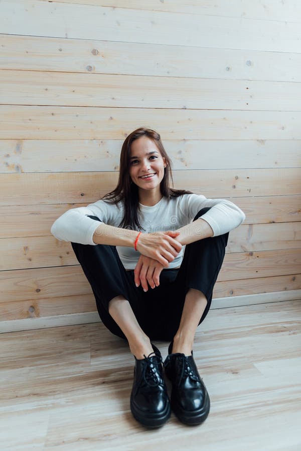 Beautiful Slender Young Woman Sitting on the Floor Stock Photo - Image ...
