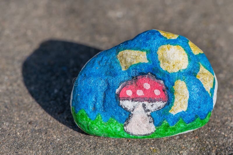 A Beautiful Small Stone Painted by a Child Stock Photo - Image of color ...