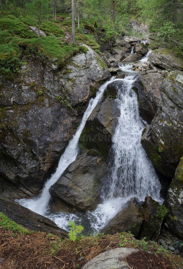 Beautiful Small Waterfall in the Mountains with Clear Cold Water Stock ...