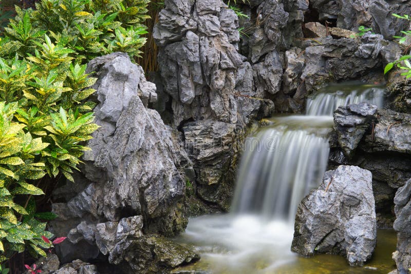 Beautiful small waterfall stock image. Image of fall - 41342723