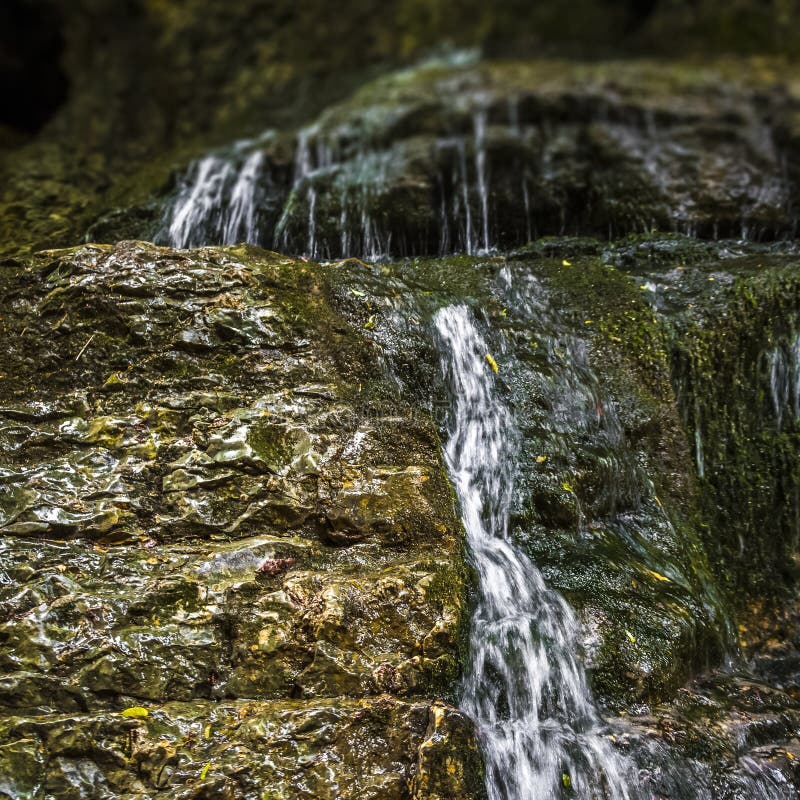 Beautiful small waterfall stock image. Image of beautiful - 257940817