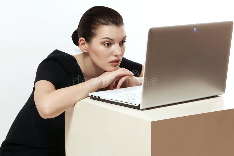 Beautiful and Smart Girl with a Laptop. Computer. Emotions. Stock Photo ...