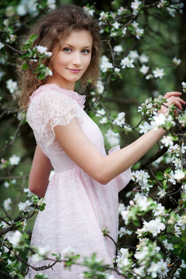 Beautiful Smiley Model in Flowers Stock Photo - Image of cute ...