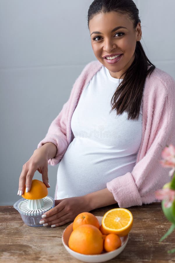 Beautiful Smiling African American Pregnant Woman Stock Photo - Image ... Beautiful Smiling African American Pregnant Woman Stock Photo - Image ...