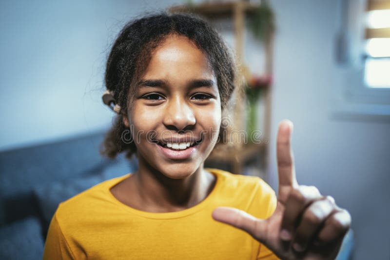 Smiling Black Deaf Girl Using Sign Language at Home Stock Photo - Image ...