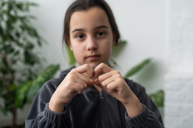 Beautiful Smiling Deaf Girl Using Sign Language. Stock Image - Image of ...