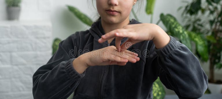 Beautiful Smiling Deaf Girl Using Sign Language. Stock Photo - Image of ...