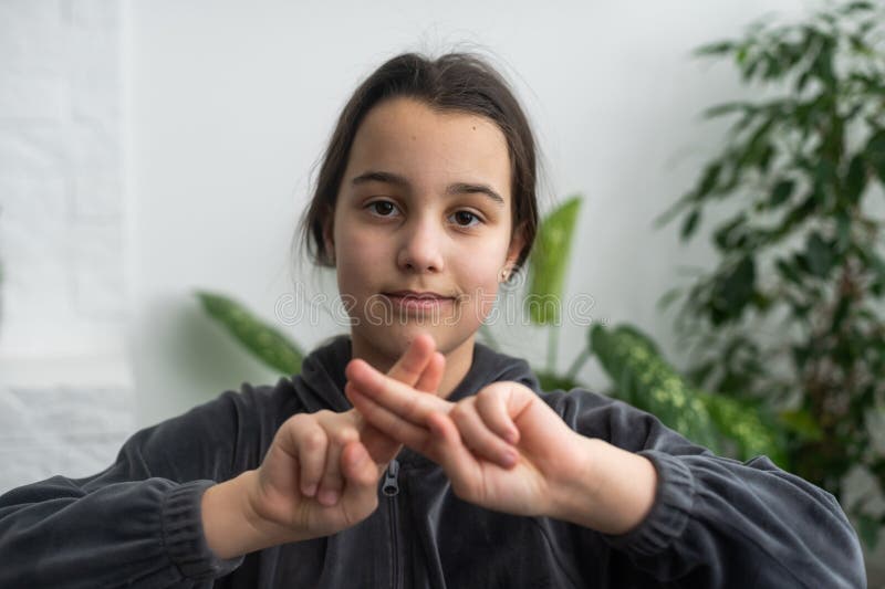 Beautiful Smiling Deaf Girl Using Sign Language. Stock Photo - Image of ...