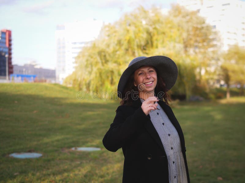 Beautiful Smiling Elegant Woman in Big Hat Smiling Portrait Stock Photo ... Beautiful Smiling Elegant Woman in Big Hat Smiling Portrait Stock Photo ...
