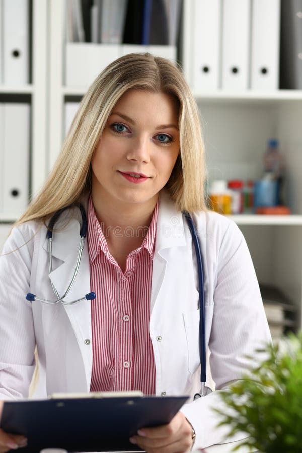 Beautiful Smiling Female Doctor Hold Clipboard Stock Image - Image of ... Beautiful Smiling Female Doctor Hold Clipboard Stock Image - Image of ...