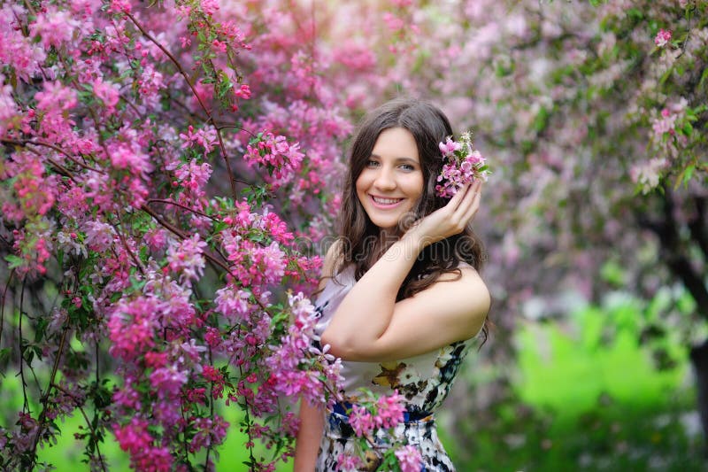 Beautiful Smiling Girl in a Spring Garden Stock Photo - Image of face ...