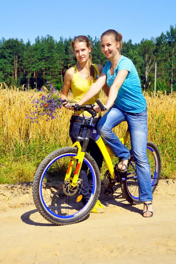 Beautiful Smiling Girls Ride Bicycle Stock Image - Image of recreation ...