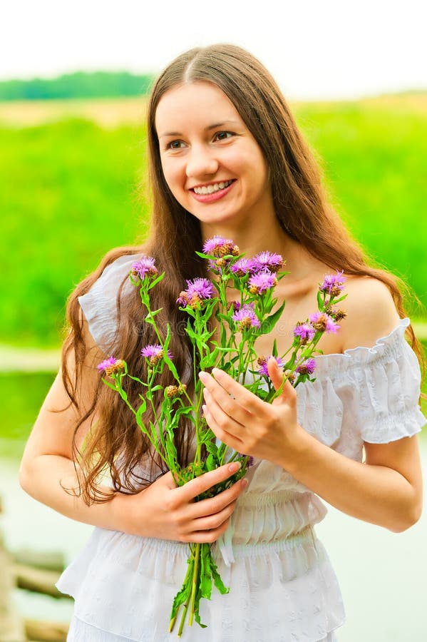 Beautiful Smiling Happy Girl with a Bouquet Stock Photo - Image of ...