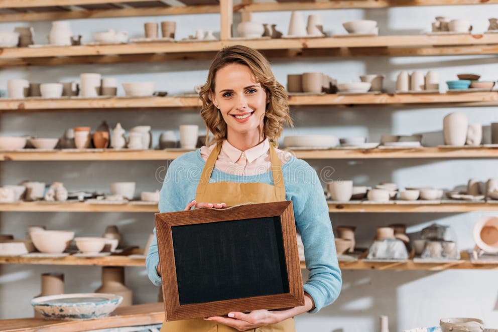 Beautiful Smiling Owner with Chalkboard Stock Photo - Image of handicraft, owner: 129329718