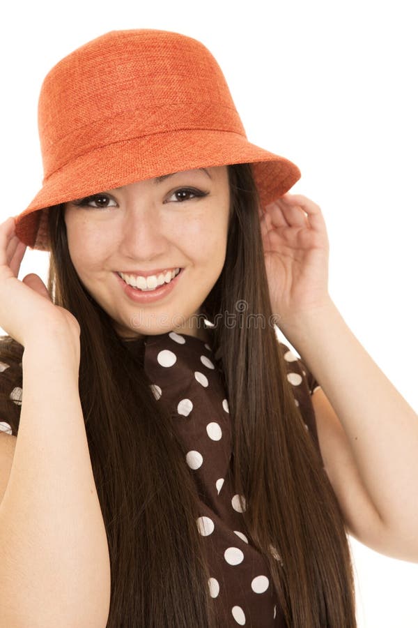 Beautiful Smiling Teen Girl Model Adjusting Orange Hat Stock Photos ...