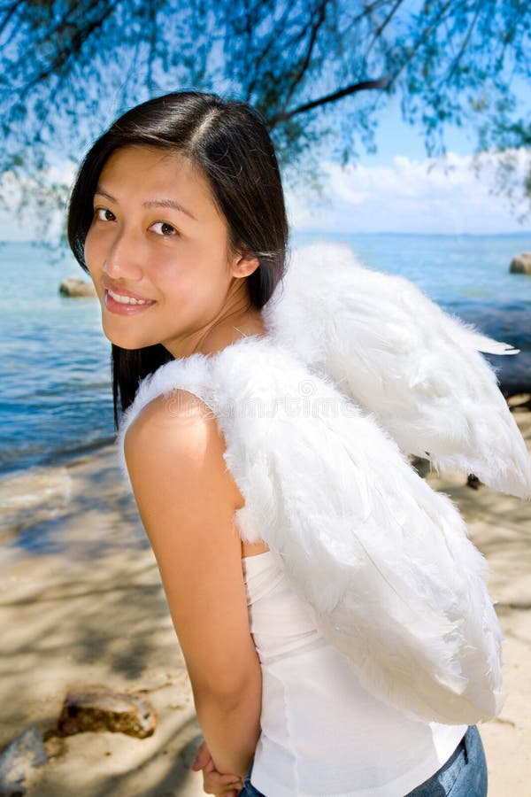 Beautiful Smiling White Angel Stock Image - Image of asian, angel: 4749161