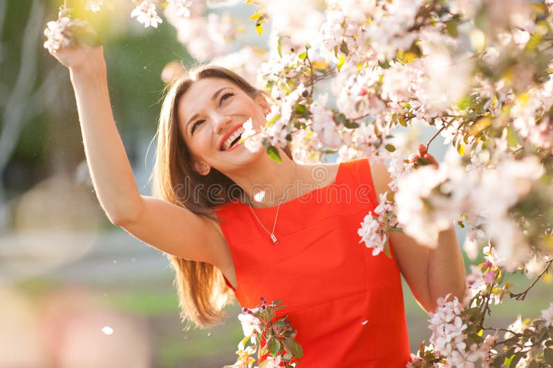 Beautiful Smiling Woman with Spring Flowers Stock Photo - Image of ...