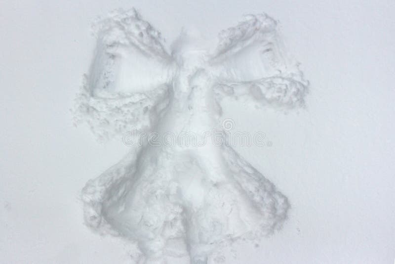 A Beautiful Snow Angel Made by a Child on Snow-white Snow Stock Image ...