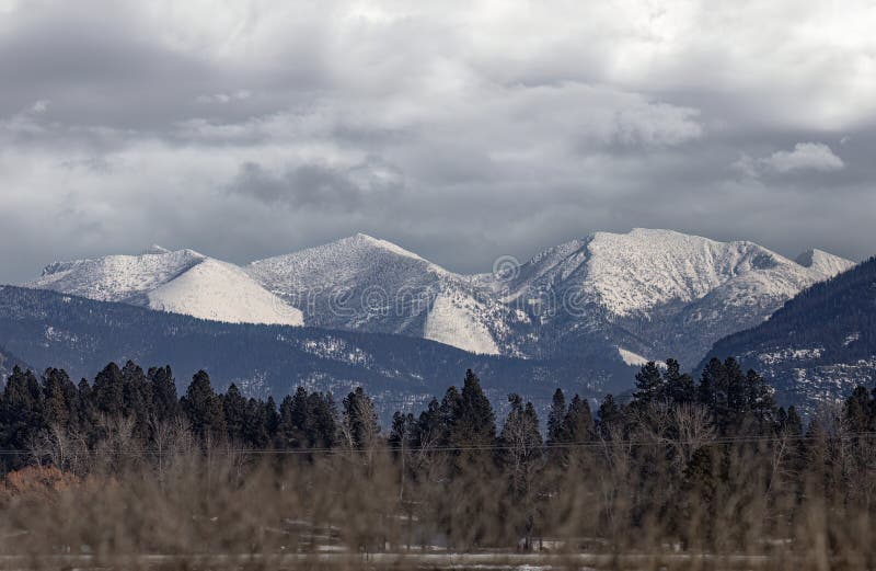 The Beautiful Snow Covered Mountains of Montana in Winter Stock Image ...