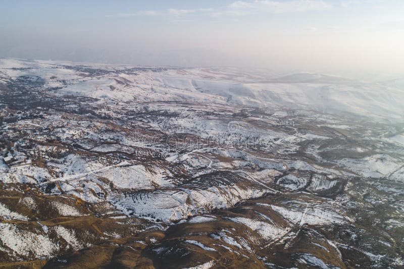 Beautiful snowy hills stock photo. Image of roadway - 140462760