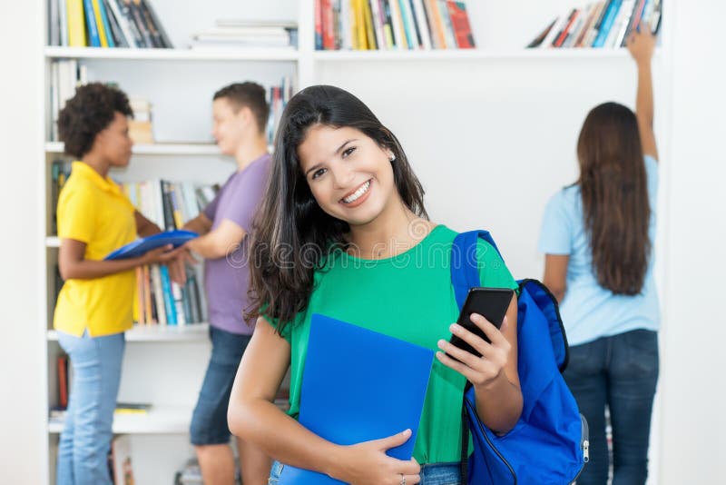Beautiful Spanish Female Student with Backpack and Mobile Phone Stock ...