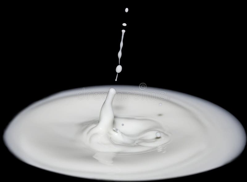 Drop of Milk - Milk Droplet Falling on White Liquid and Creating Splash ...