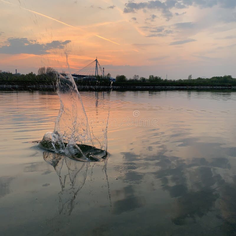Beautiful Splash of Water at Sunset Stock Image - Image of splash ...