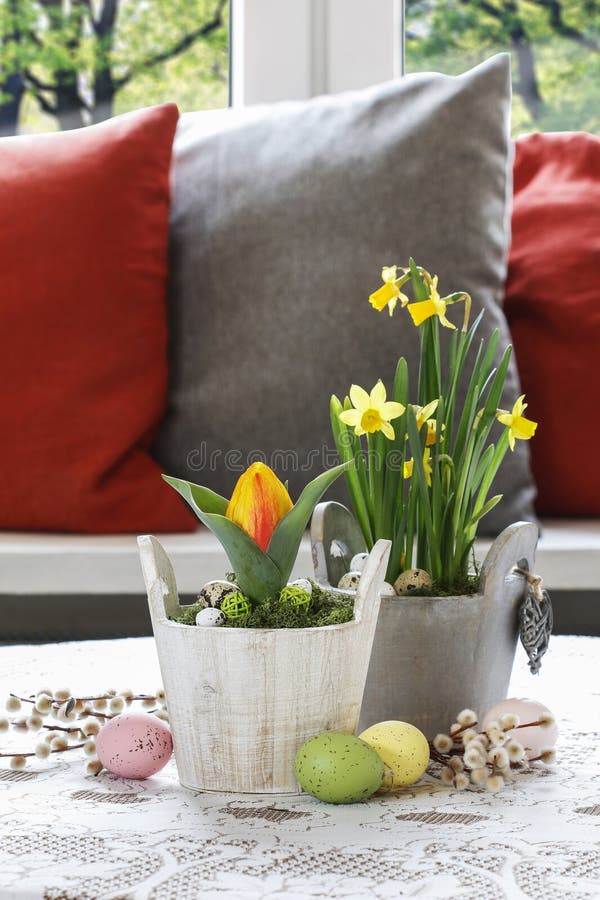 Beautiful Spring Flowers on Wooden Table. Traditional Easter Decoration ...
