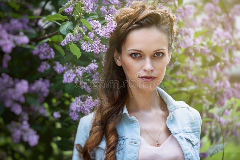 Beautiful Spring Girl in Blooming Lilac Tree Stock Photo - Image of ...