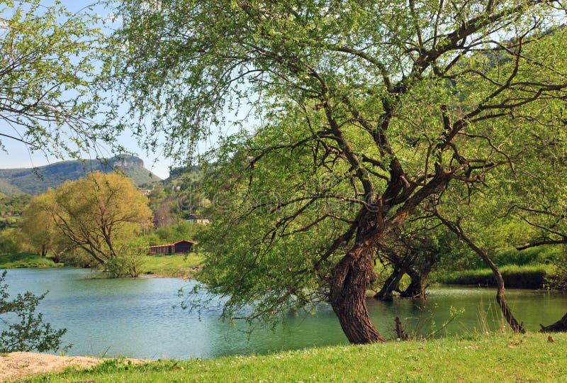 Beautiful spring lake stock image. Image of hill, mere - 13119351