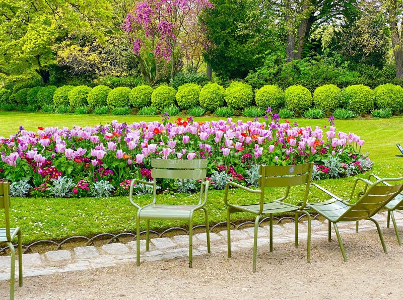 Green Chairs in the Park during the Month of April in Paris Editorial ...