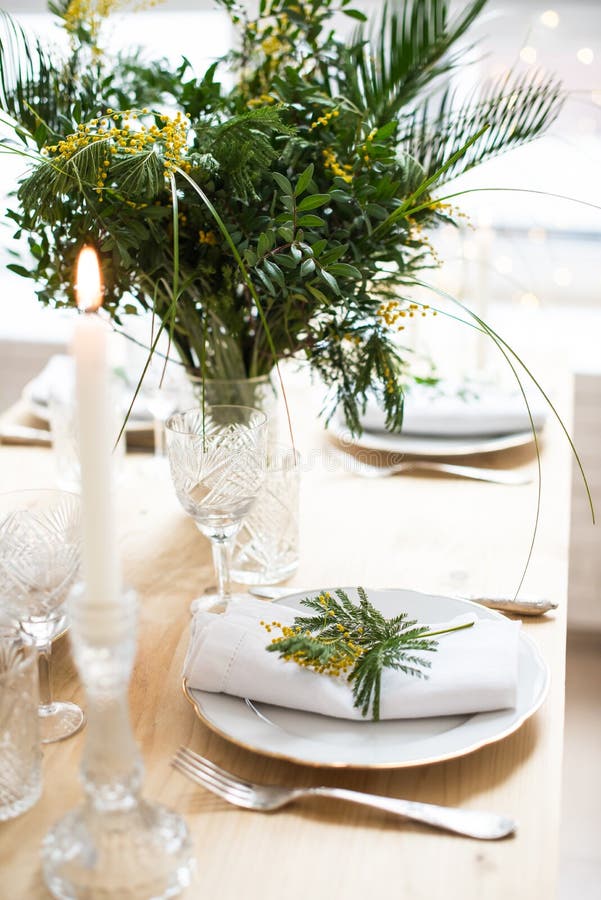Beautiful Springtime Table Setting with Green Leaves and Mimosa ...