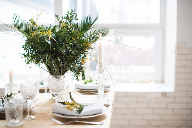 Beautiful Springtime Table Setting with Green Leaves and Mimosa ...