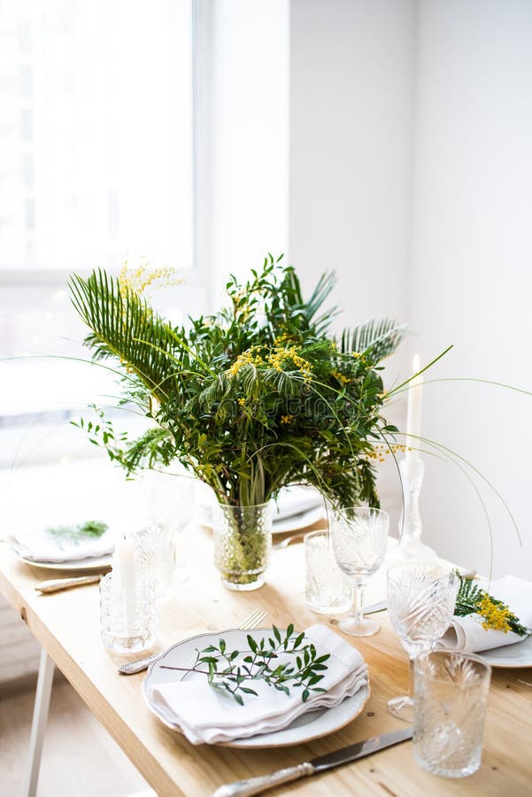 Beautiful Springtime Table Setting with Green Leaves and Mimosa ...