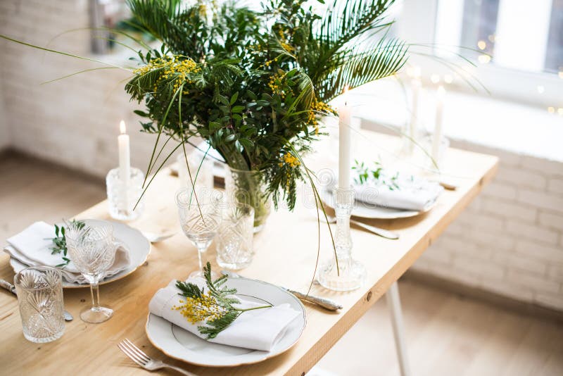 Beautiful Springtime Table Setting with Green Leaves and Mimosa ...