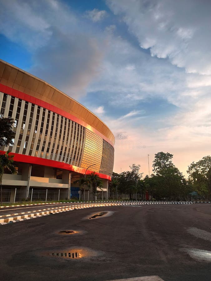 The Beautiful Stadium Building Lit Up by the Sunset and Blue Sky Stock ...