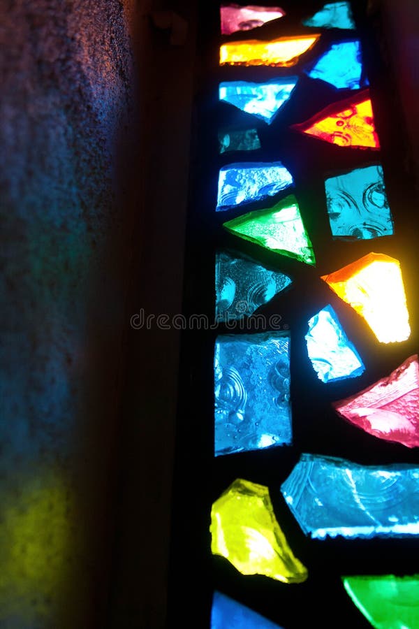 Stained Glass Window Casting Light on Wall Stock Photo - Image of ...