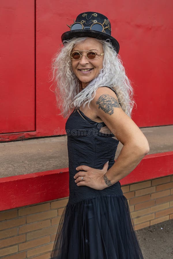 Posing Steampunk Lady stock image. Image of happy, person - 268876637