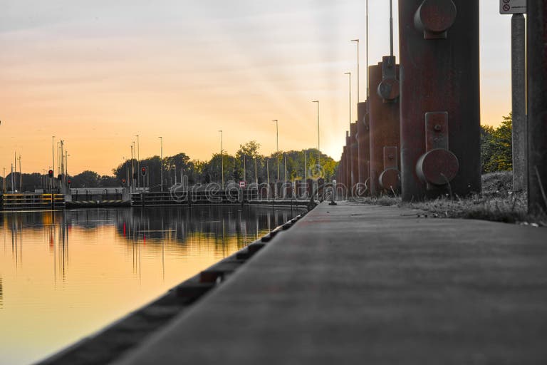 Setting sun. stock image. Image of waterway, evening - 363280123