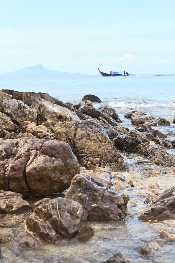 Beautiful stone beach stock photo. Image of island, boat - 38291184