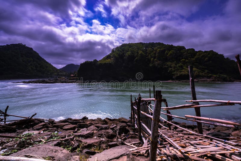 Beautiful Stone on the Edge with Moderate Waves Stock Photo - Image of ...