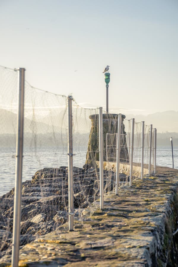 Beautiful Stone Pier Leading To the End of the Bay. Stock Photo - Image ...