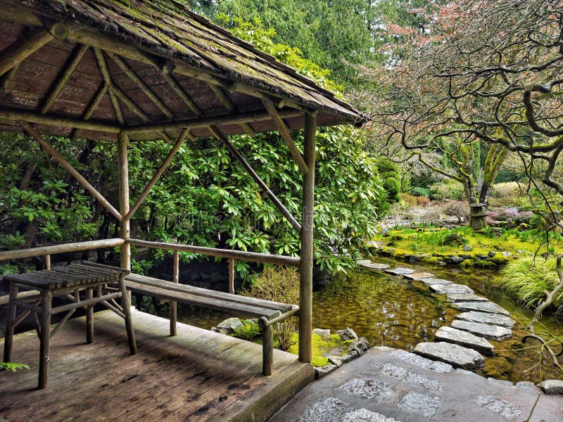 Beautiful Stone Walkway and a Hut in a Park Stock Photo - Image of ... Beautiful Stone Walkway and a Hut in a Park Stock Photo - Image of ...