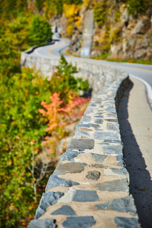 Beautiful Stone Wall Winding Along Road that Zig Zags through Mountain ...