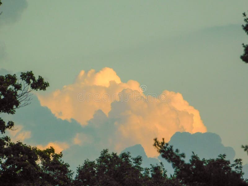 Beautiful Storm Clouds Building & Billowing Up at Sunset Stock Photo ...