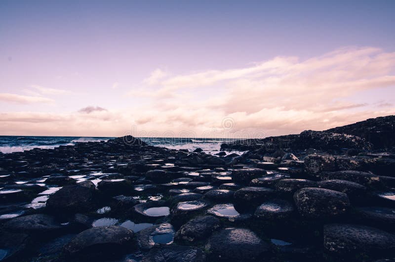 Beautiful and Strange Rocks on the Beach with the Reflection of the Sky ...