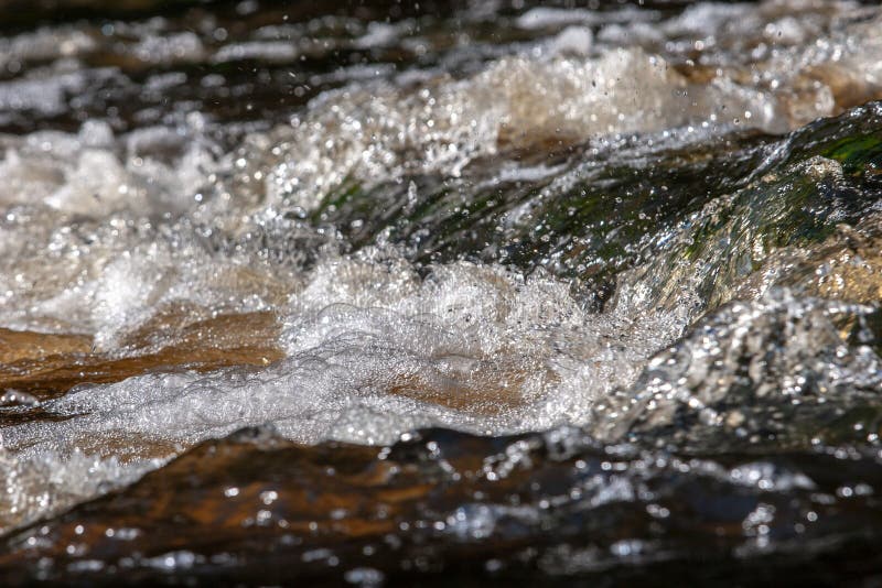 Beautiful Stream of Water with Bubbles and Foam. Stock Image - Image of ...